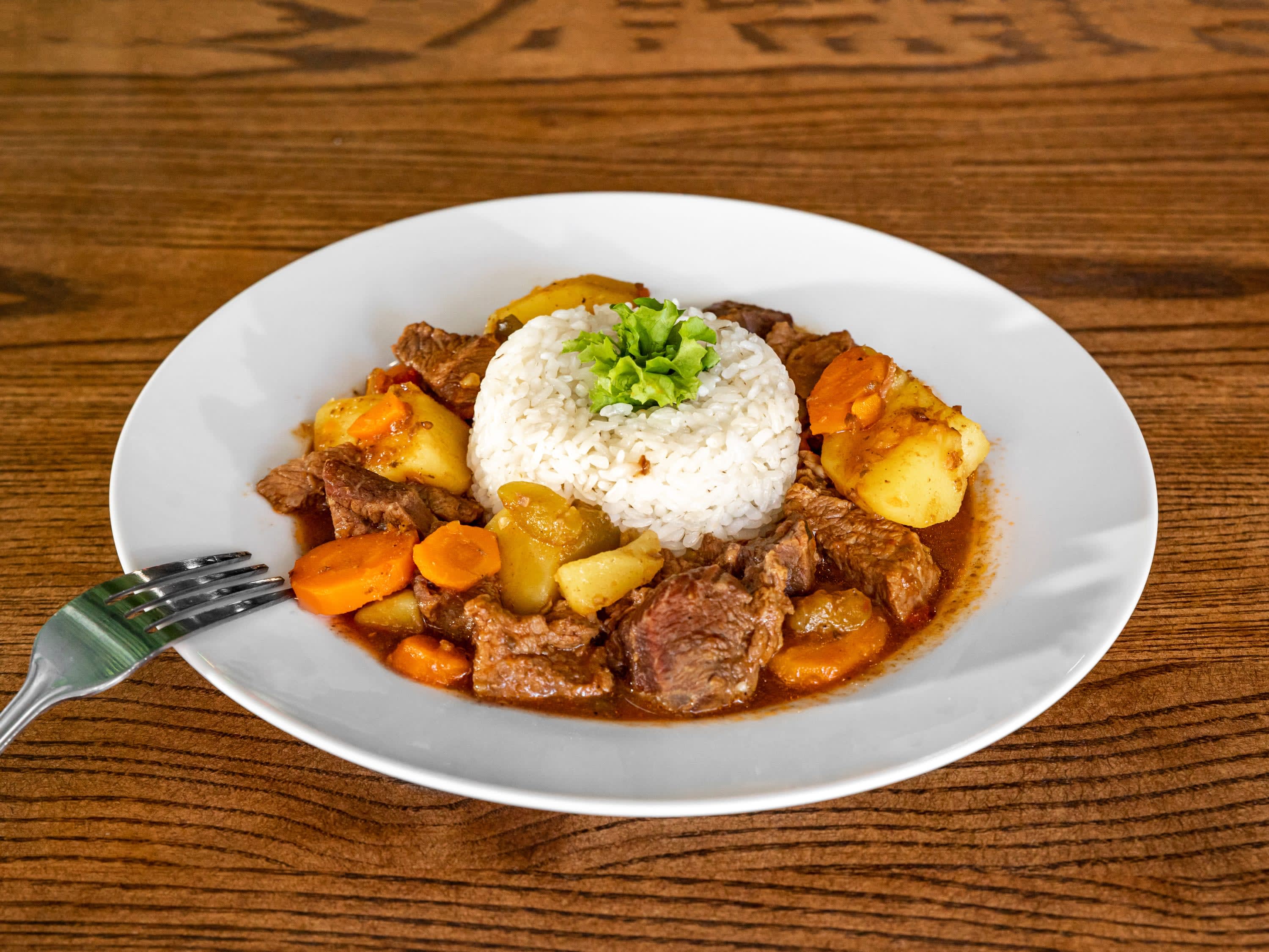 Carne Guisada Con Arroz