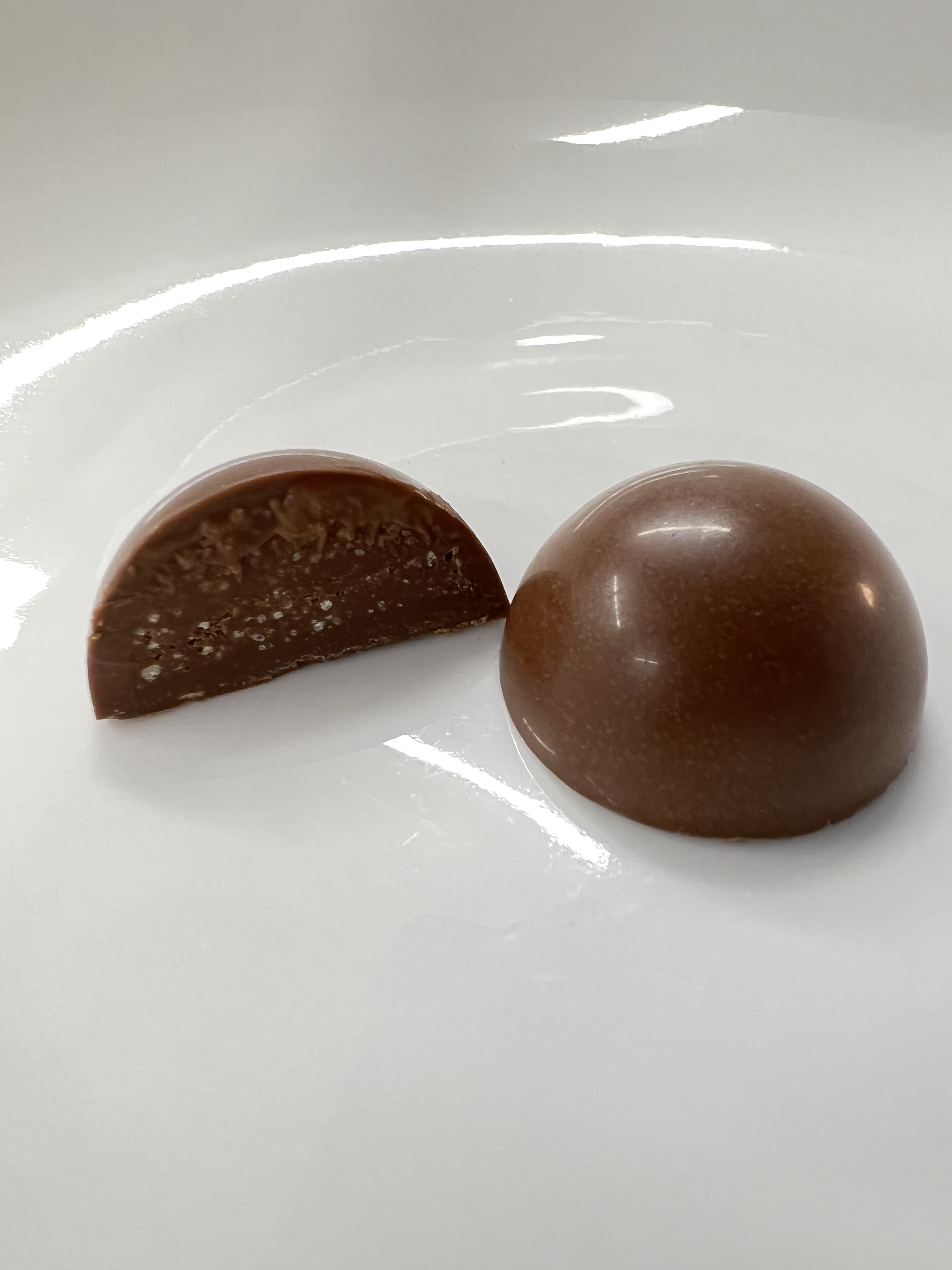 Almond Dark Chocolate - Current Delicious Flavors - Tom's Chocolates ...