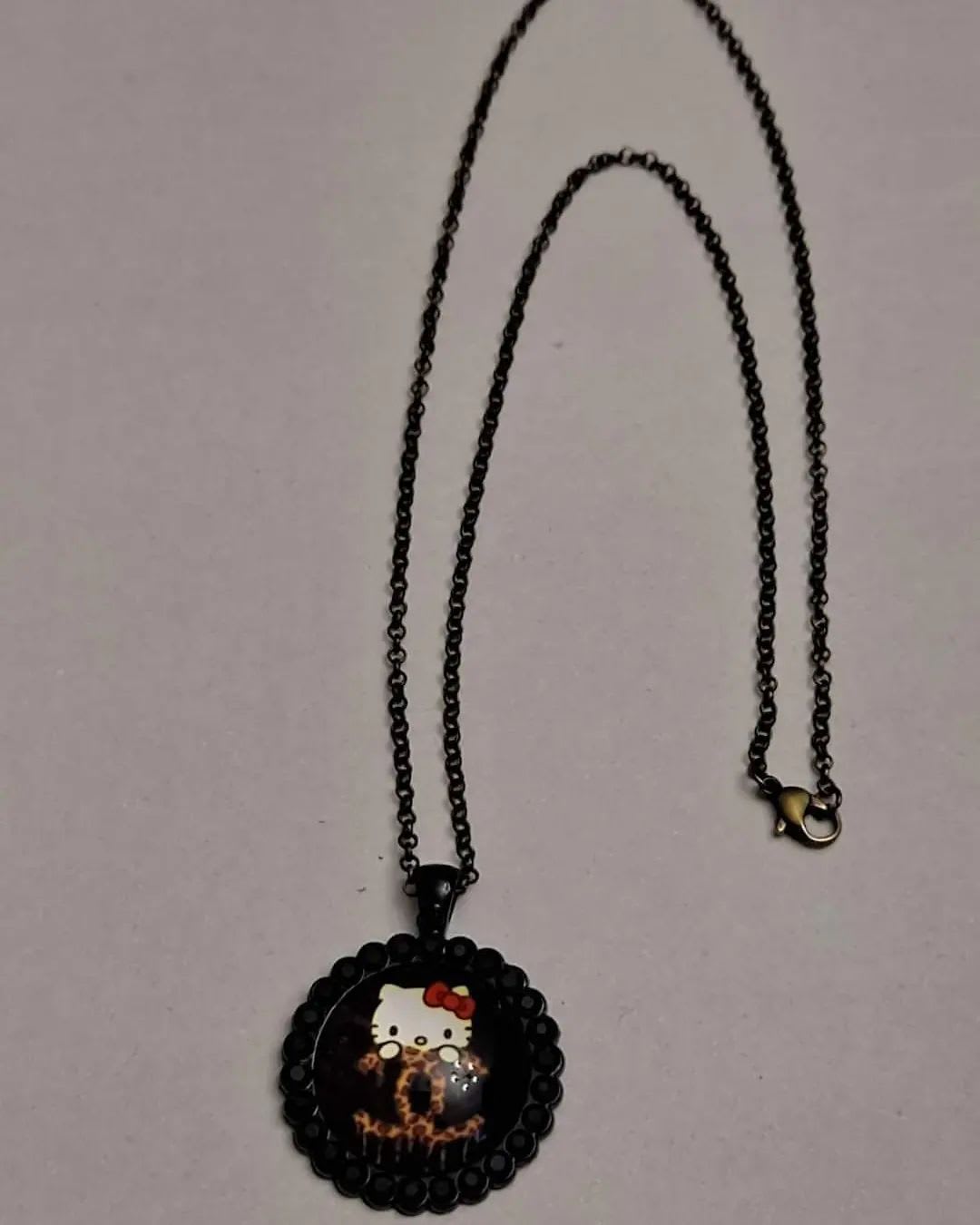 Chanel Hello Kitty Necklace - Necklaces - Leggetts Legacy Kustoms ...