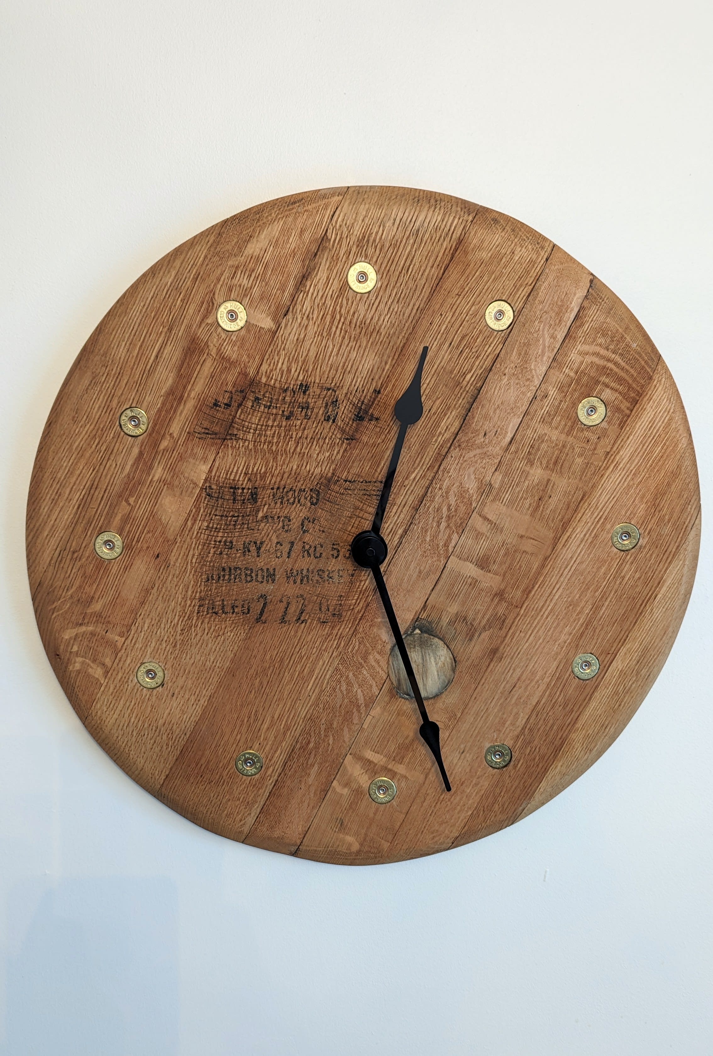 Whisky barrel lid clock with shotgun cartridge number markers and ...